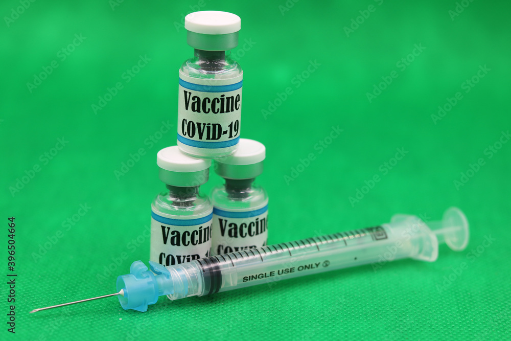 Covid19 SARS-Cov-2 syringe and vials vaccines with English text and ...