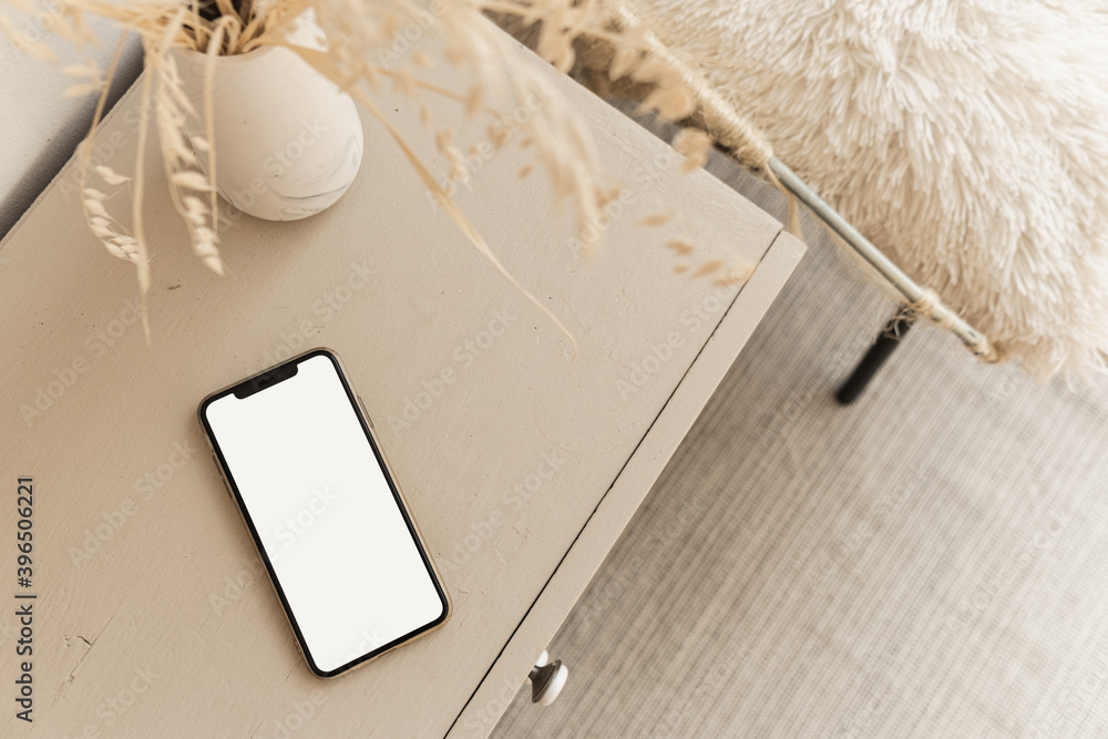 Flatlay of blank screen mobile phone on beige pastel table. Flat lay ...