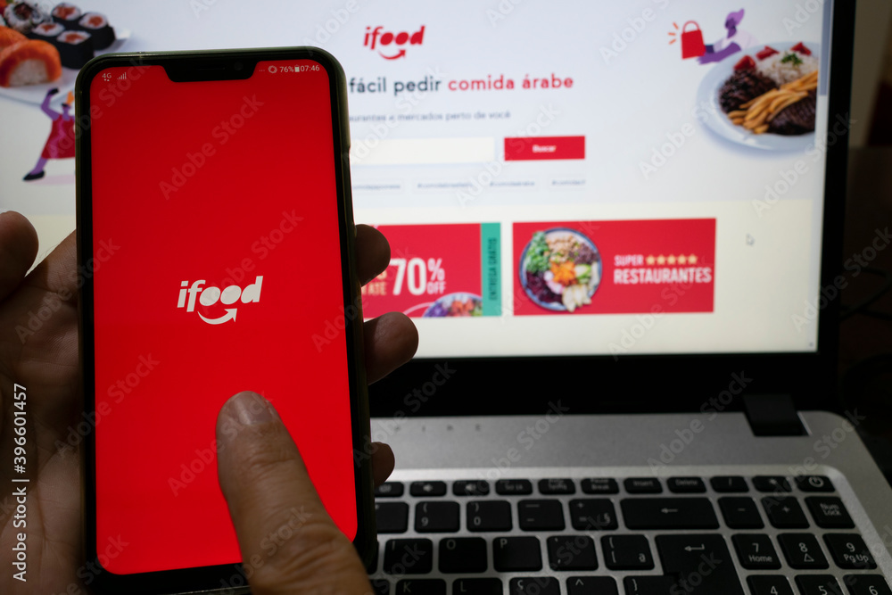 São Paulo, Brazil - December 1, 2020: hand holding cell phone with ...