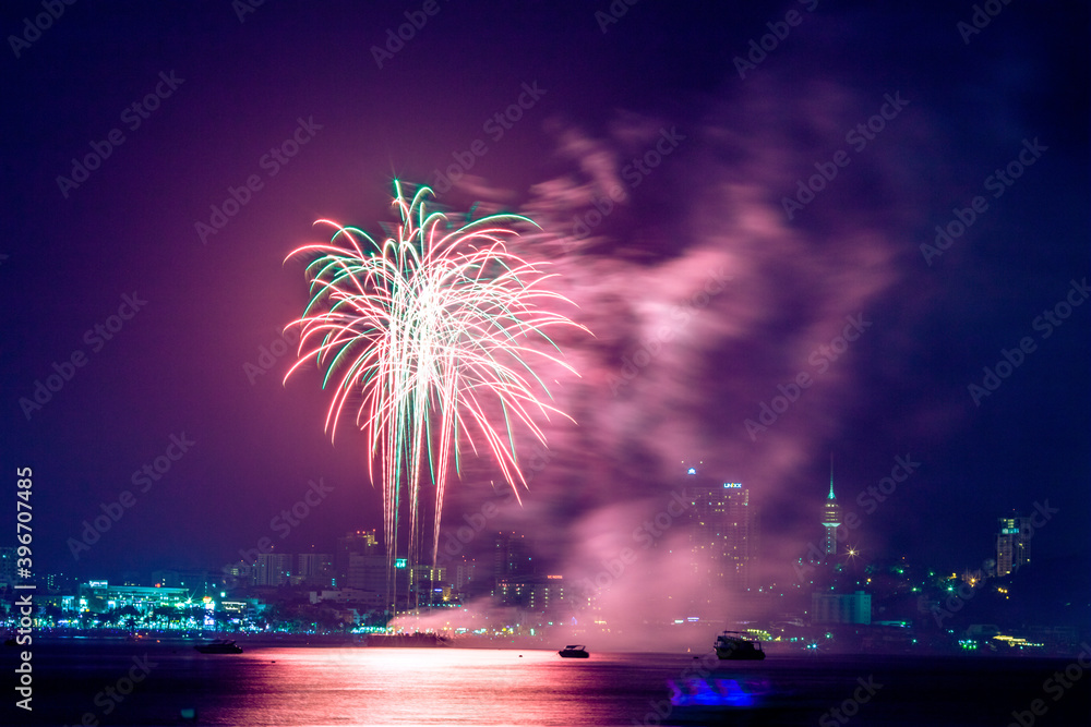 The blurred background of fireworks (light trails) is beautiful at ...