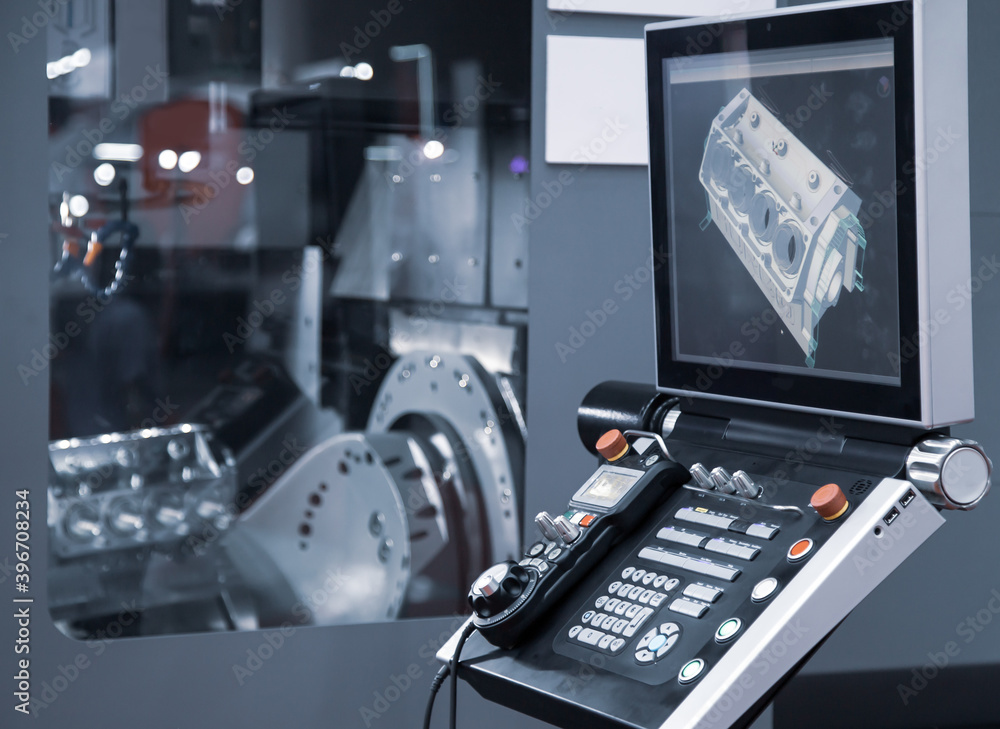Control panel of 5-axis CNC milling machine cutting automotive engine ...