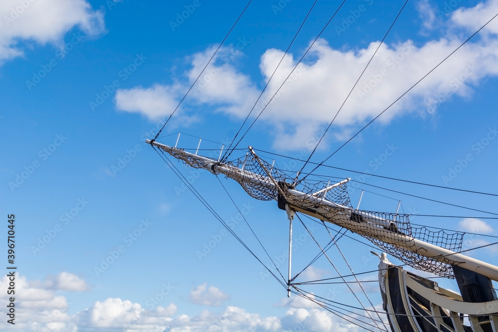 Forward head sailing mast of a wooden sailboat. Clear summer blue sky ...