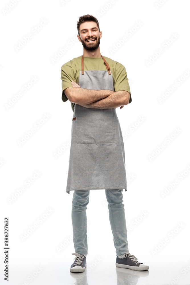 people, profession and job concept - happy smiling barman in apron with ...