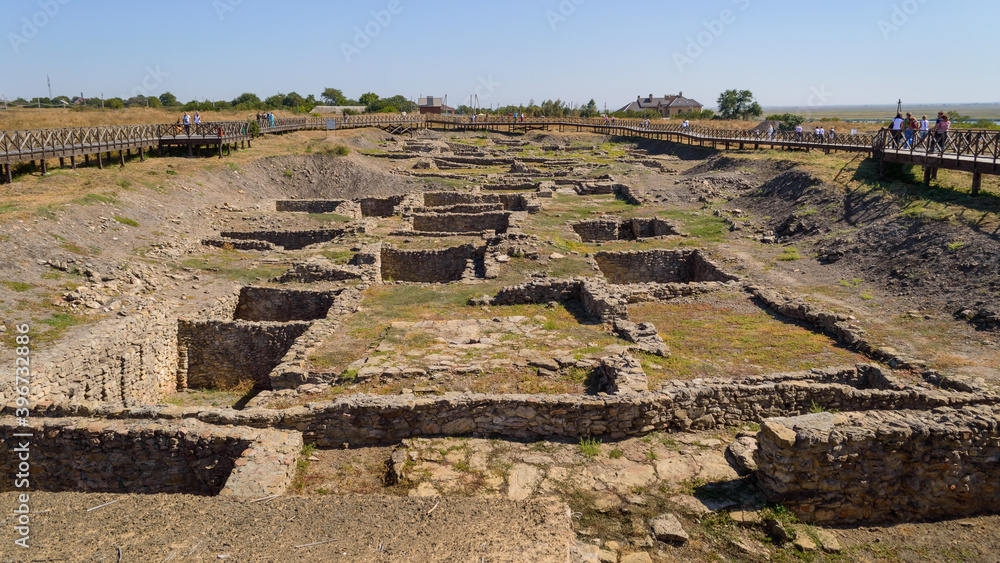 Ancient ancient city. Historic Village. Stone city walls among the ...