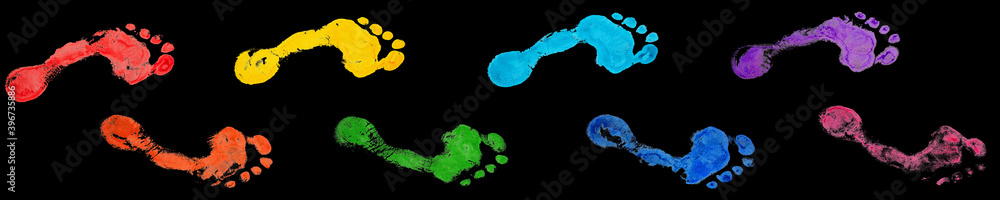 Rainbow color human footprints way black background isolated, colorful ...