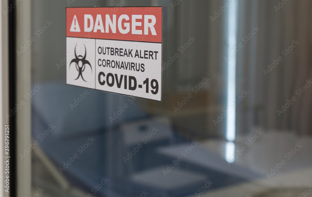 Outbreak alert signage in front of control area, quarantine room ...