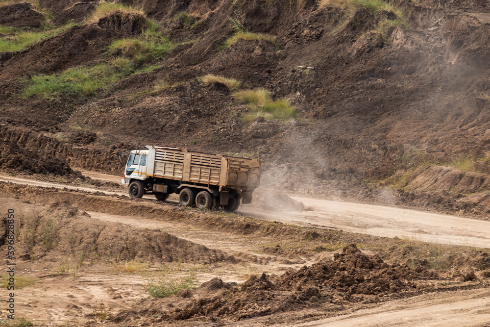 Large dumpers Loading into the truck body Produce useful minerals ...