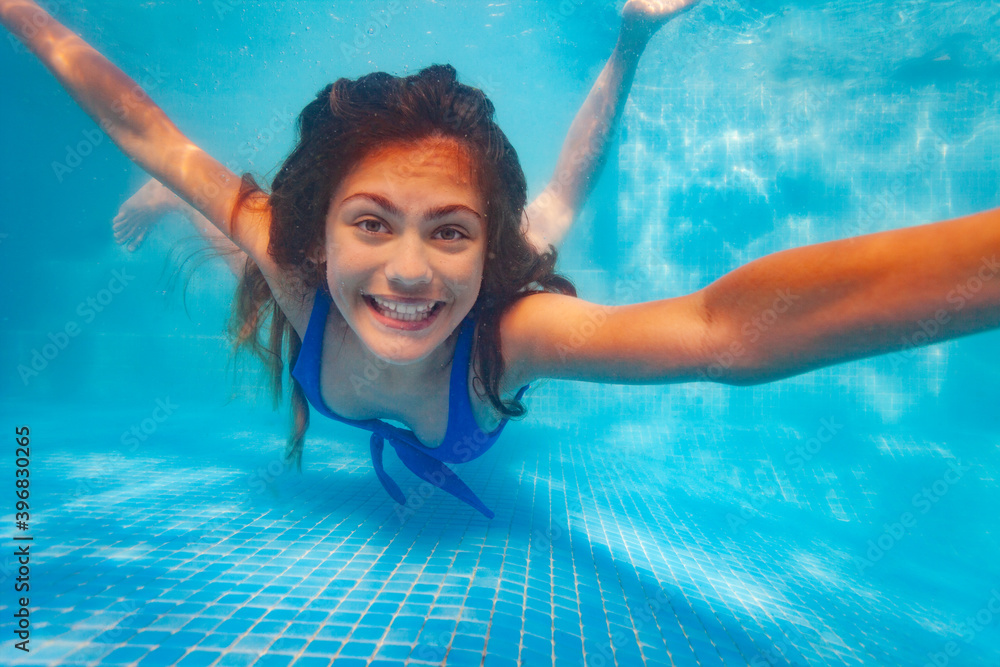 Portrait of happy teen smiling positive girl with big smile float ...