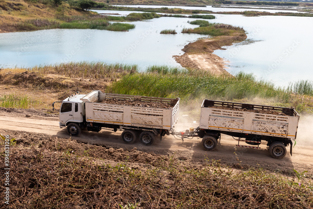 Large dumpers Loading into the truck body Produce useful minerals ...