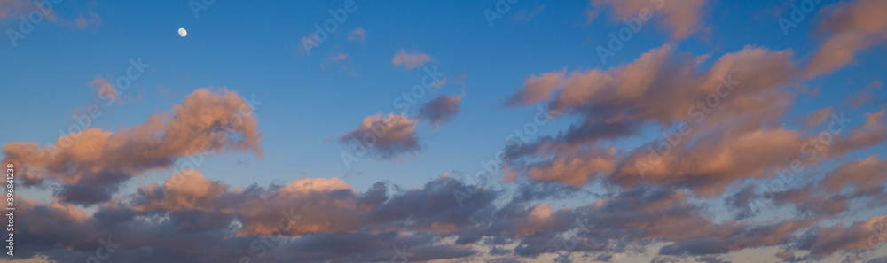 Clouds and full Moon in twilight sky view. Panoramic night sky ...