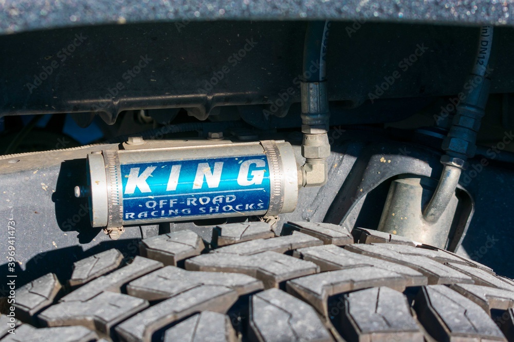 Remote reservoir of King off road racing shock installed on truck ...