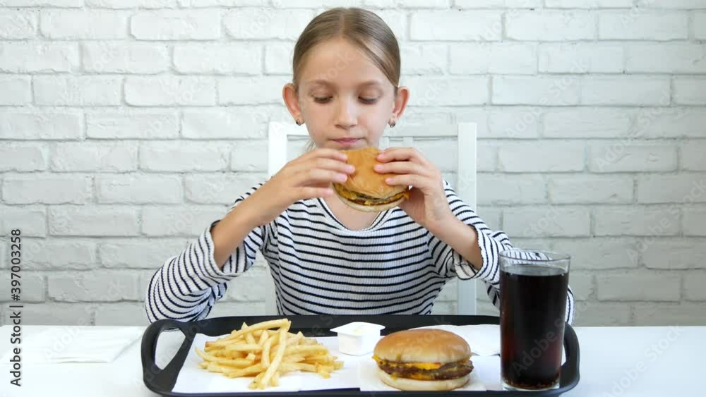 Girl Eating Fast Food, Kid Eats Hamburger in Restaurant, Hungry ...
