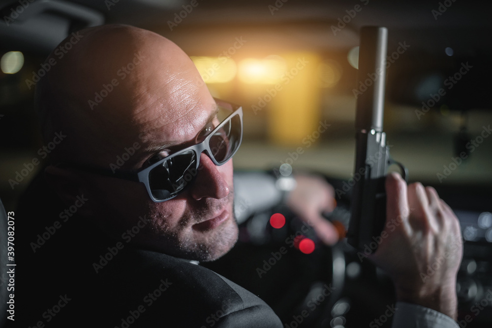 Special agent of secret service with a gun concept portrait. Stock ...