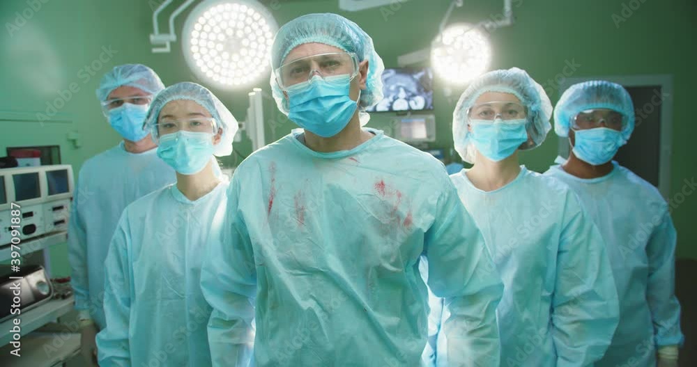 Portrait of multi-ethnic male and female professional doctors in ...