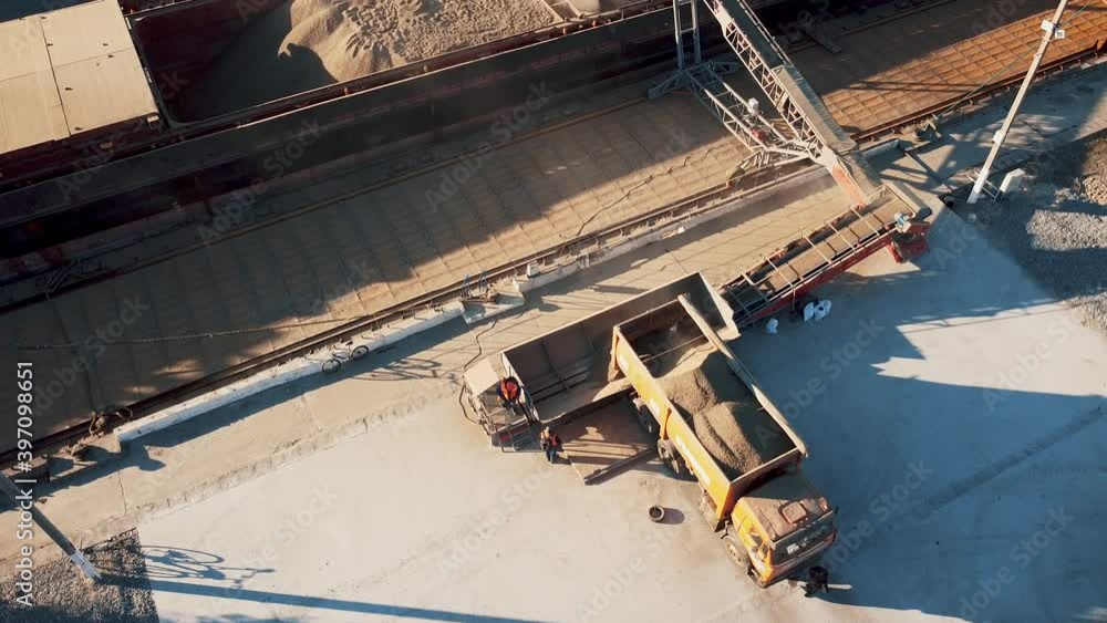 Loading and unloading at seaport. Grain elevator loading silage ...
