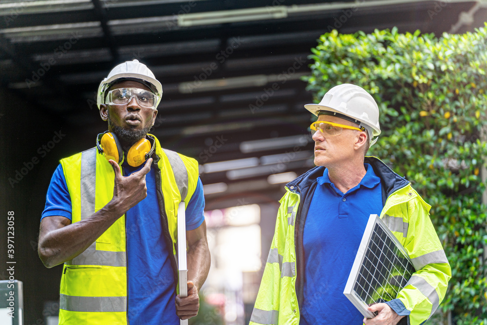 team factory worker technician engineer men in green working suit dress ...