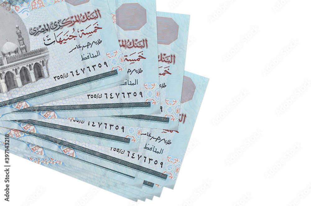 5 Egyptian pounds bills lies in small bunch or pack isolated on white ...