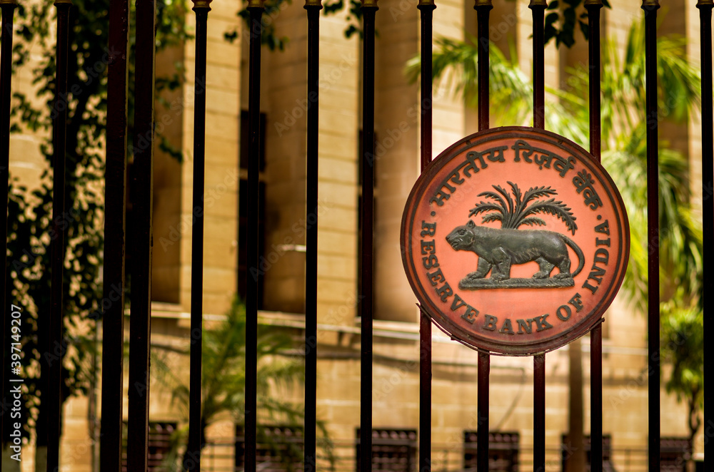 Delhi, India, 2020. RBI logo on the closed iron gate of Reserve Bank of ...