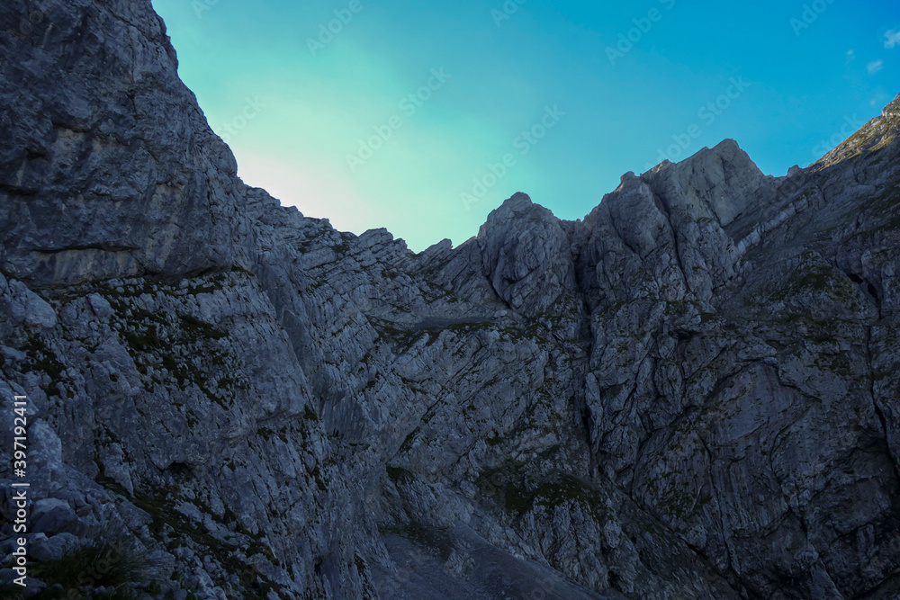 A panoramic view on Alpine slopes in Austria. There are sharp ans steep ...