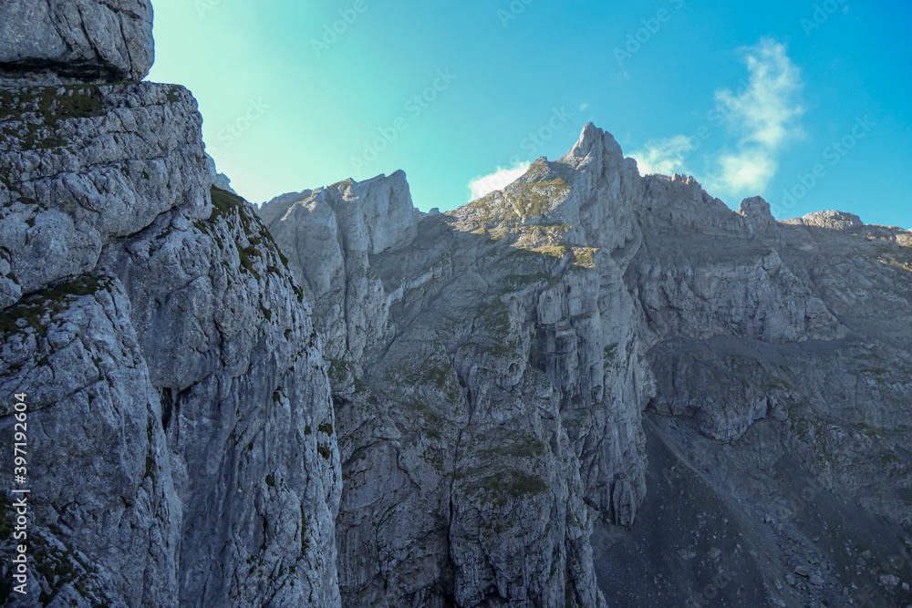 A panoramic view on Alpine slopes in Austria. There are sharp ans steep ...
