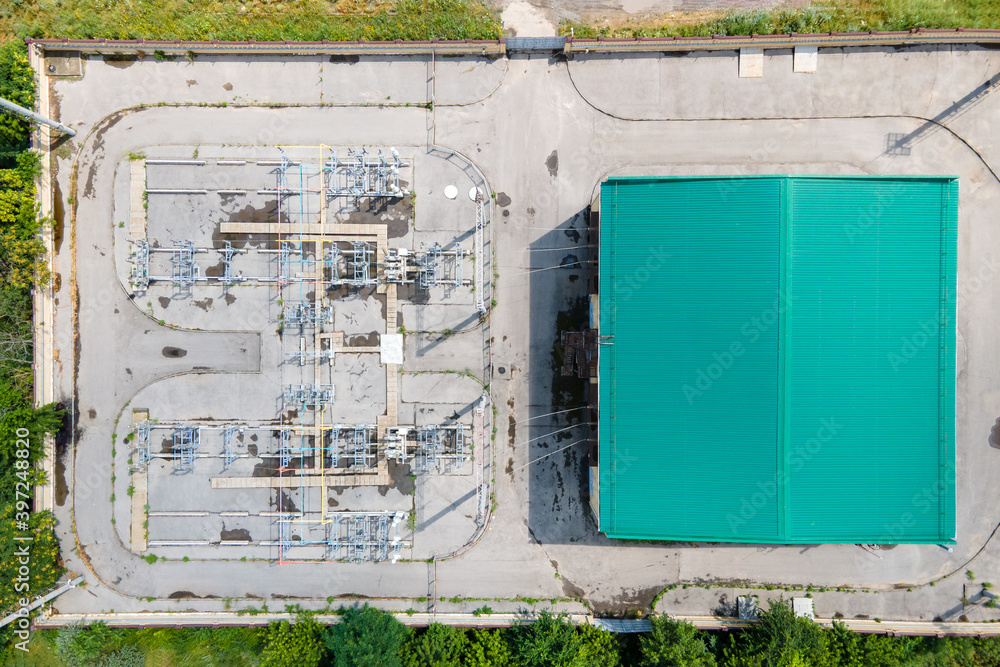 Aerial top view electric substation industry with green roof, View from ...