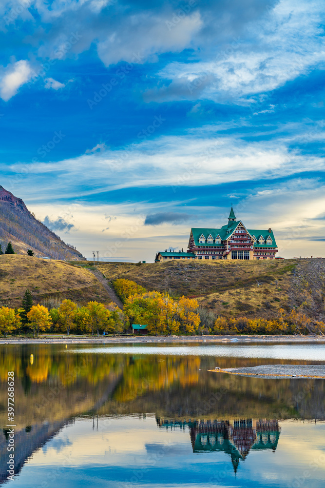 Waterton Lakes National Park lakeshore in autumn foliage season morning ...