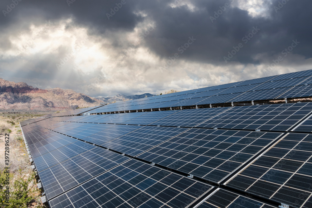 Solar panels with Mojave desert storm clouds at Red Rock Canyon ...