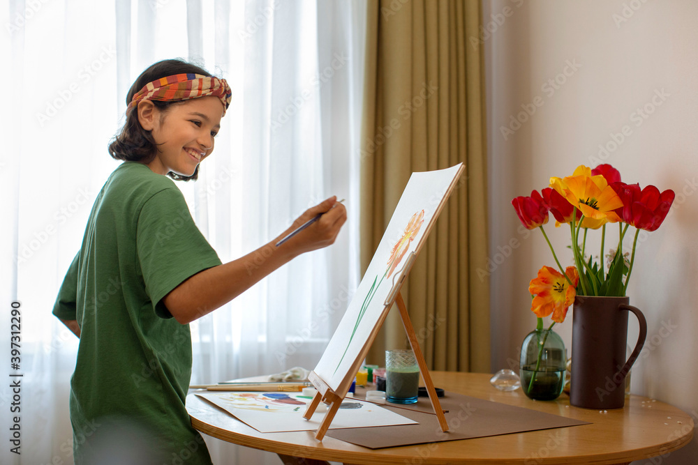 Cute girl drawing at home Stock Photo | Adobe Stock