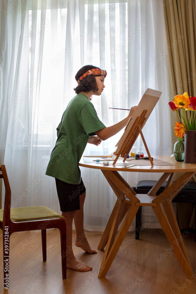 Cute girl drawing at home Stock Photo | Adobe Stock