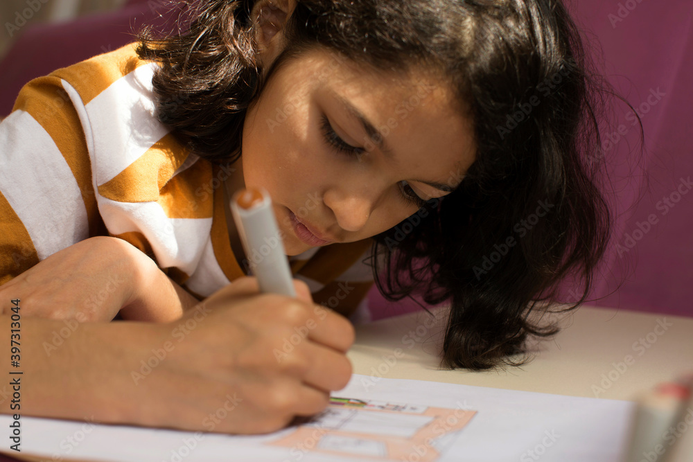 Cute girl draws with a markers Stock Photo | Adobe Stock