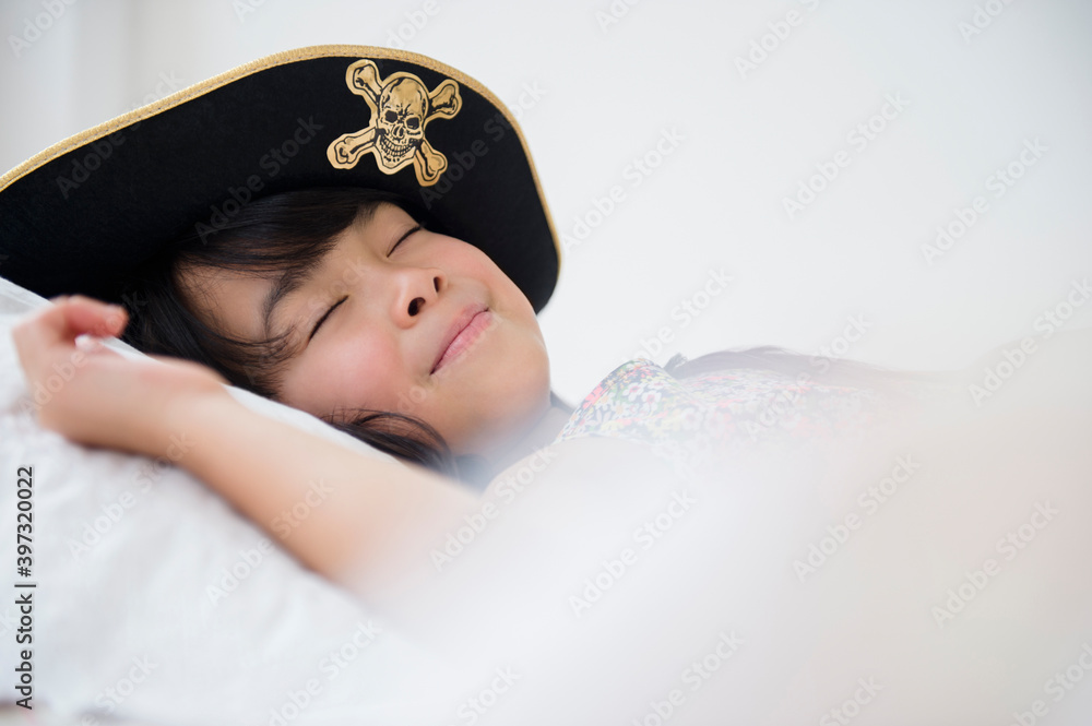 Filipino girl sleeping in dress-up costume foto de Stock | Adobe Stock