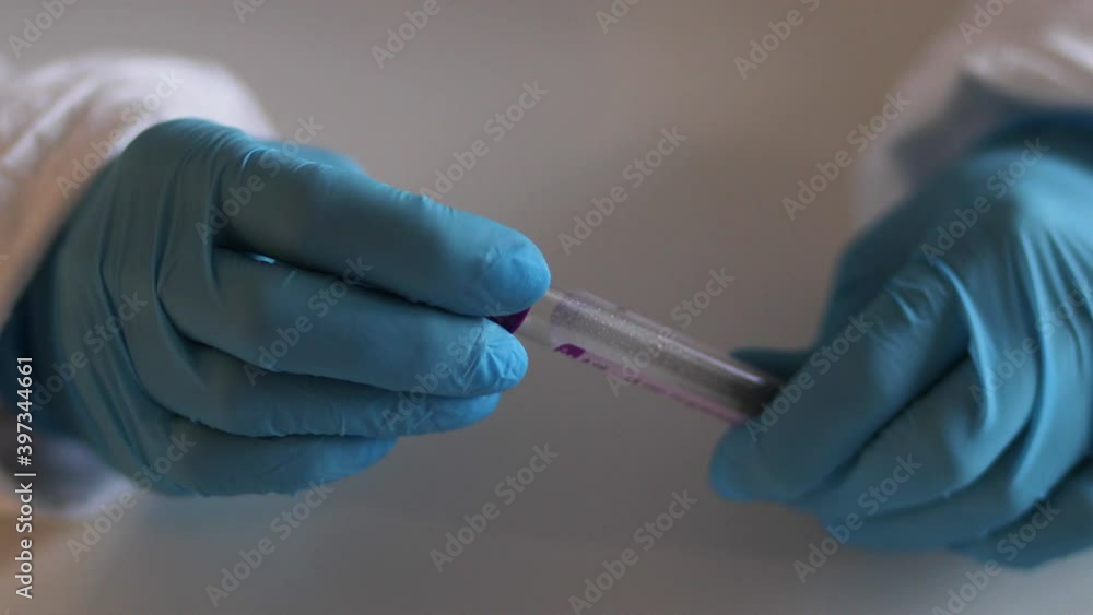 Stockvideon Process of coronavirus testing examination by nurse medic ...