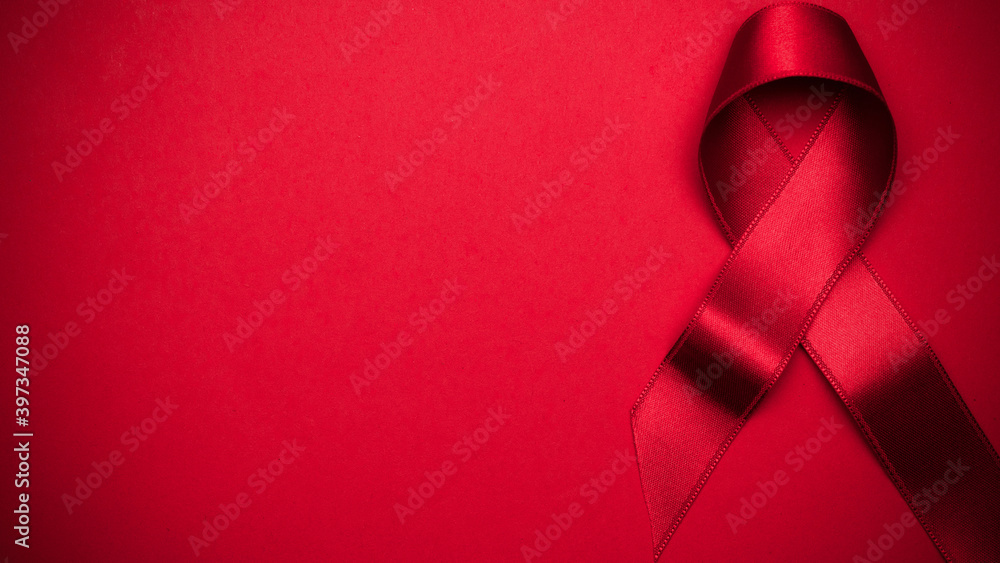 Aid ribbon silk. Red ribbon symbol in hiv world day on dark red ...