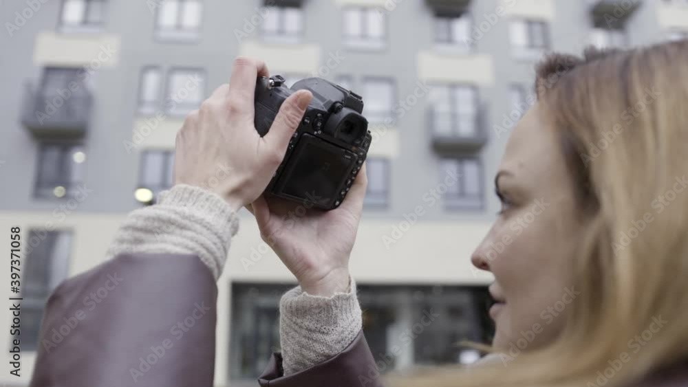 Discover new places, side view of photographer at work outdoors taking ...
