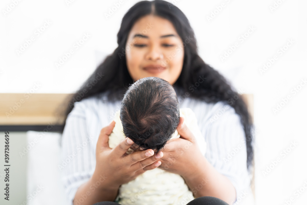 African American Mom Carrying Of Her Newborn Baby At Home Happy Mum african-american-mom-carrying-of-her-newborn-baby-at-home-happy-mum