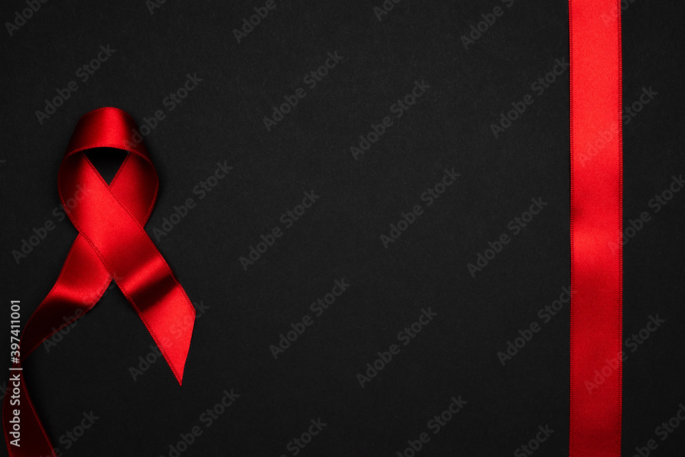 Aid ribbon silk. Red ribbon symbol in hiv world day on black background ...