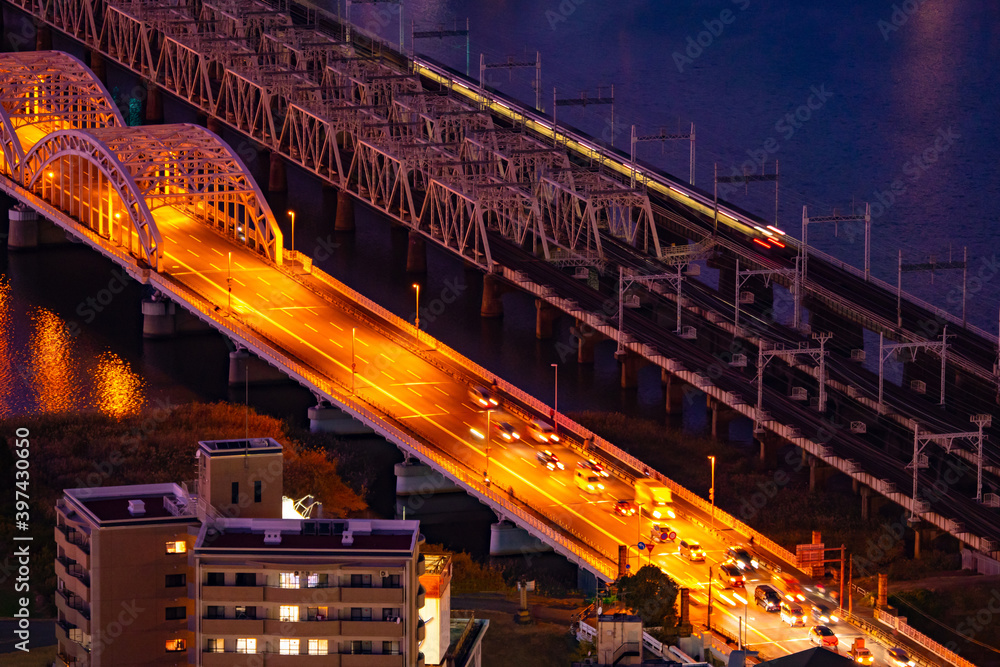 Japan. The Bridges Of Osaka. Railway and road bridges over the Yodo ...
