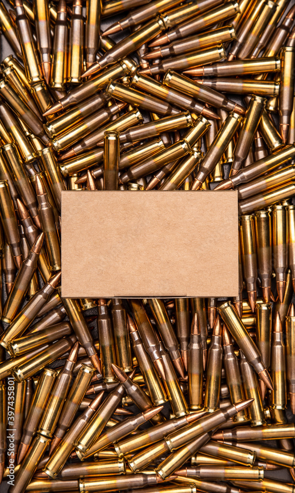 Background from cartridges for a carbine. A box of cartridges ...