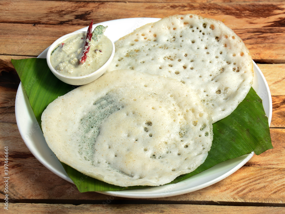 Kerala traditional breakfast food Appam or Kallappam or Vellappam ...