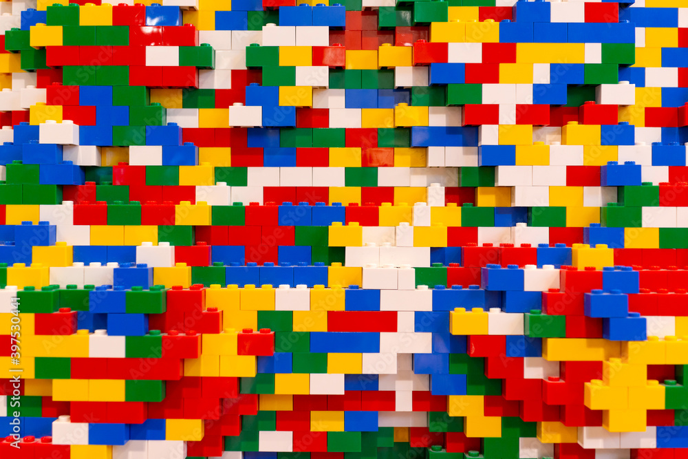 Stack of colorful lego brick background. Lego is a line of plastic ...