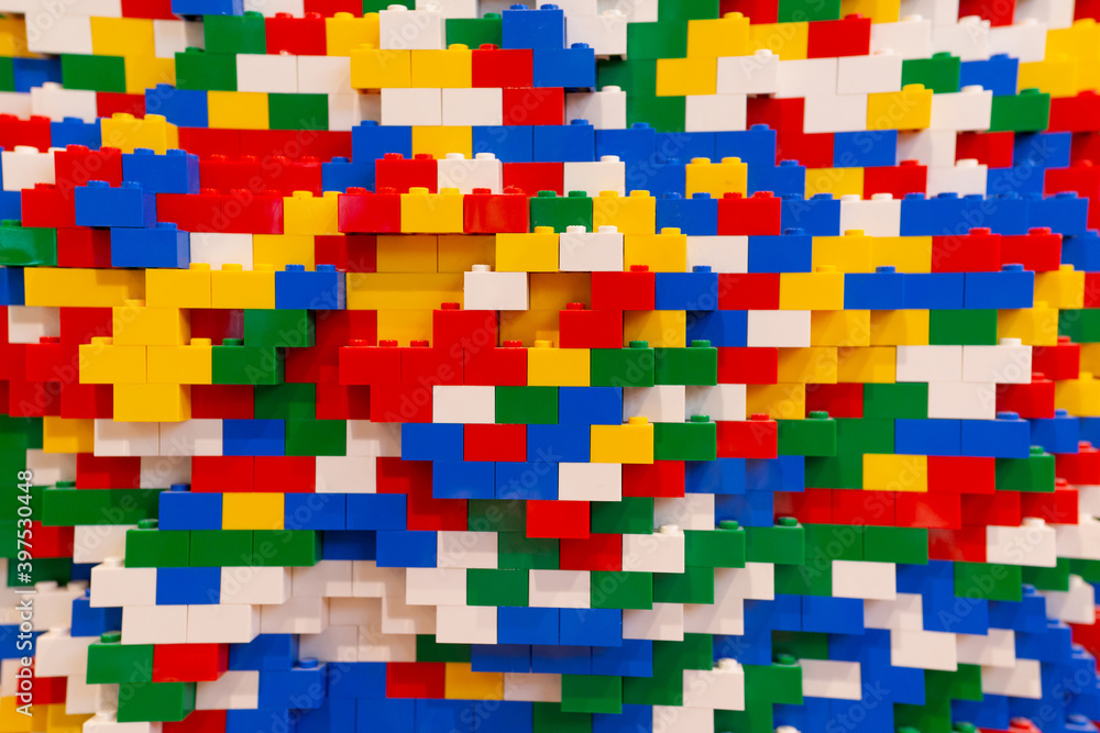 Stack of colorful lego brick background. Lego is a line of plastic ...