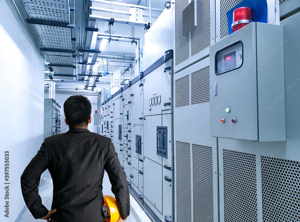 Electrical engineering inspect the electrical control room Stock Photo ...