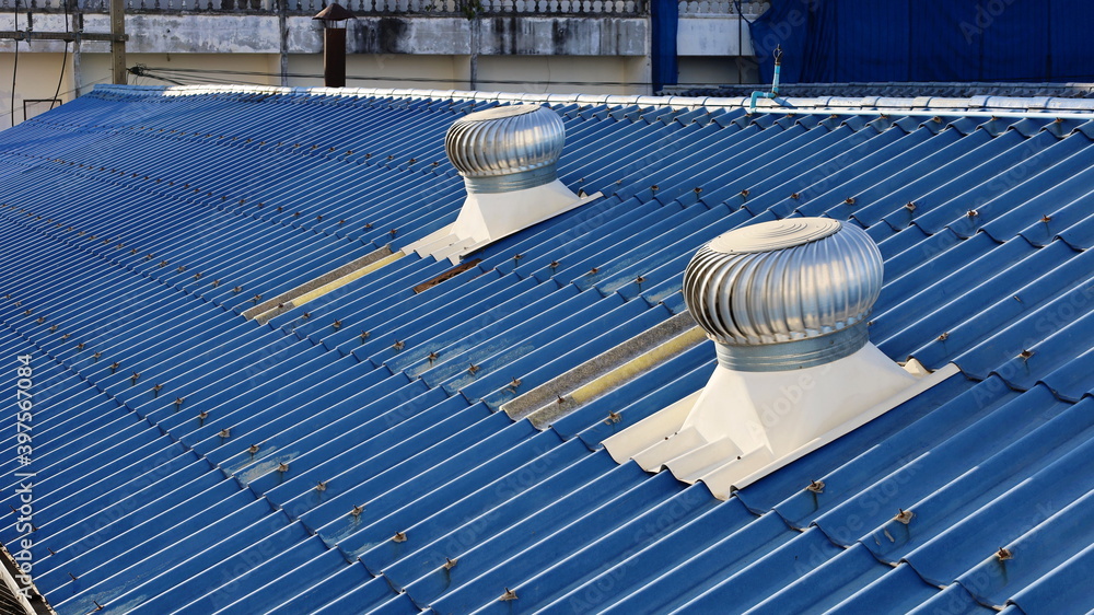 Foto de Exhaust fan on the roof. Ventilators for suction and ...