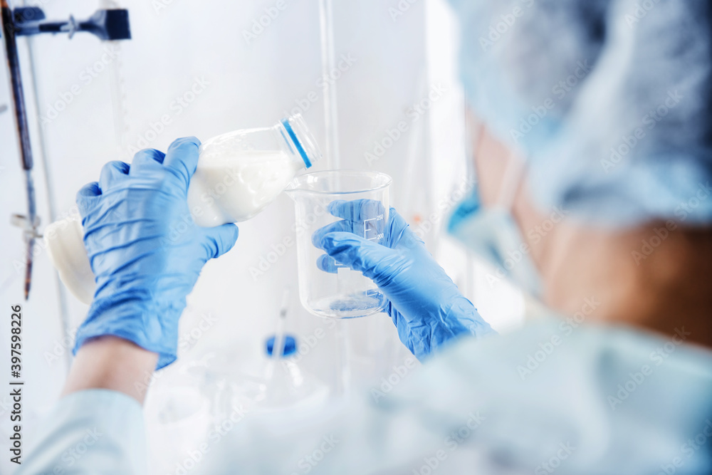 Quality control test of milk in laboratory. Dairy factory industry ...