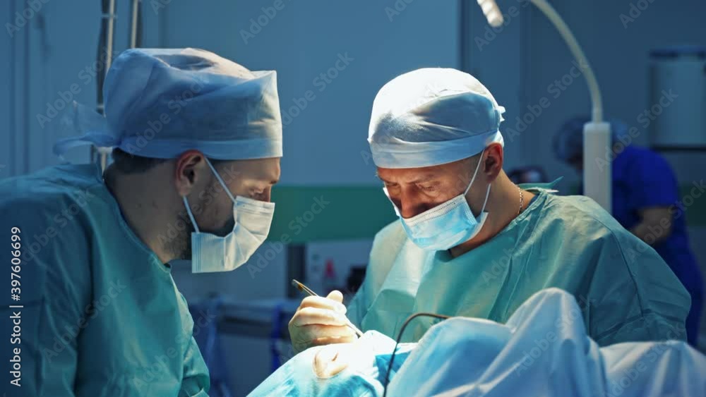 Doctors do plastic cosmetic operation. Blepharoplasty on face of a ...