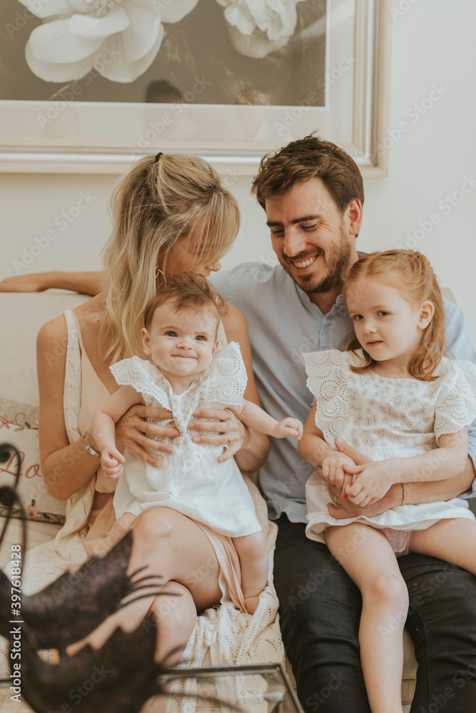 family with children - little girls having a free moment of intimacy ...