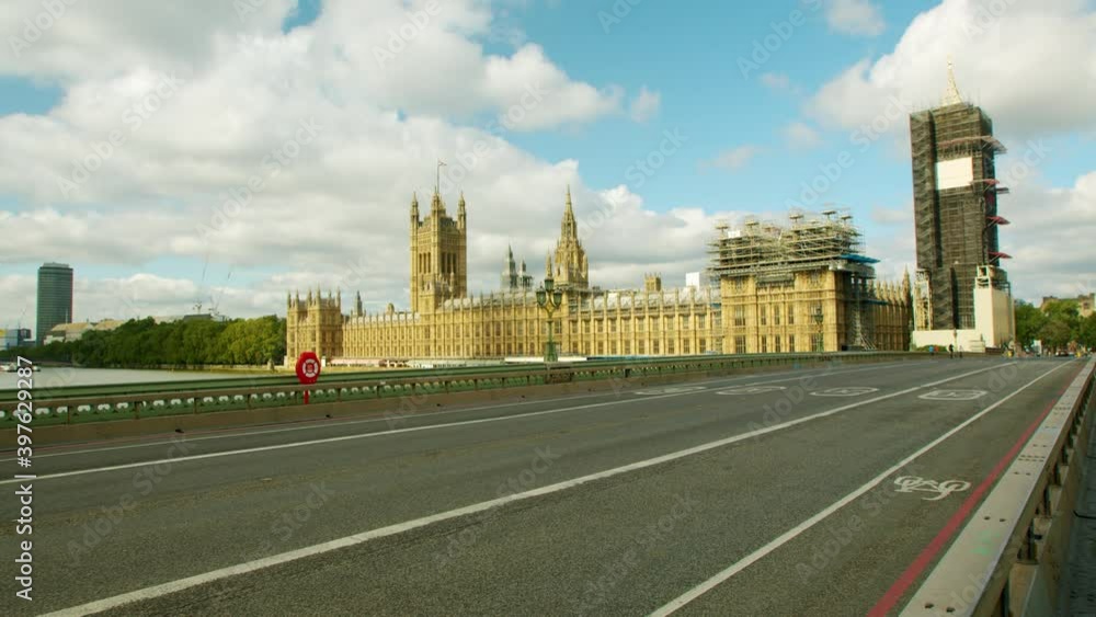 Lockdown in London, empty Westminster Bridge streets with the Houses of Parliament and Big Ben ...