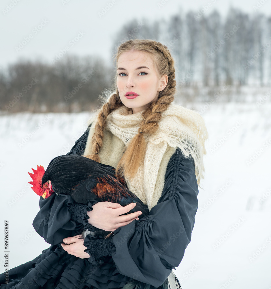 Beautiful Russian woman in a traditional dress. Russian village. Winter ...