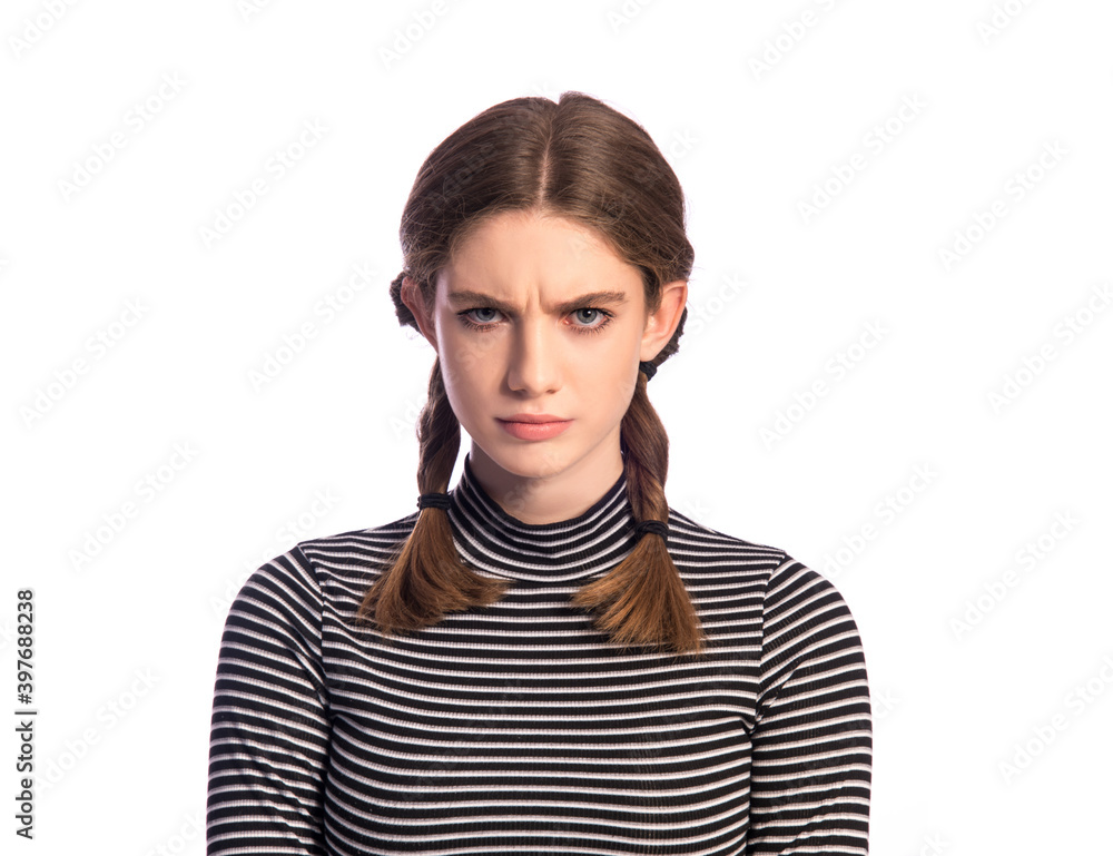 portrait of cute teen girl with angry facial expression Stock Photo ...
