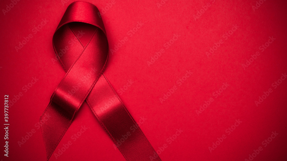 Hiv day. Red ribbon symbol in hiv world day on dark red background ...